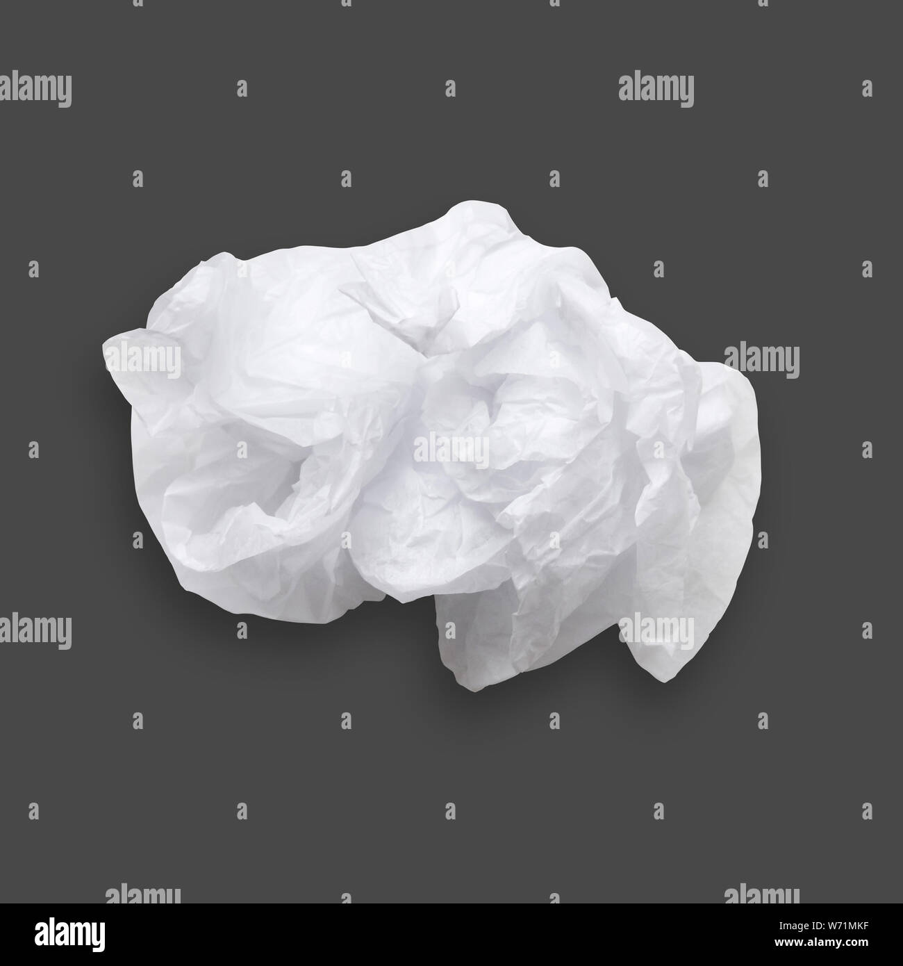 Crumpled white paper or plastic bag garbage isolated on gray background ...