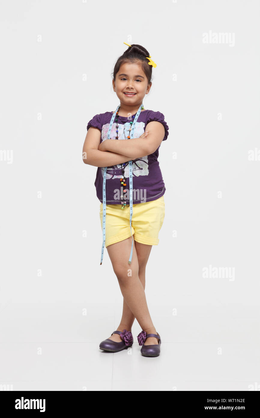 Girl dressed up as a fashion designer Stock Photo - Alamy