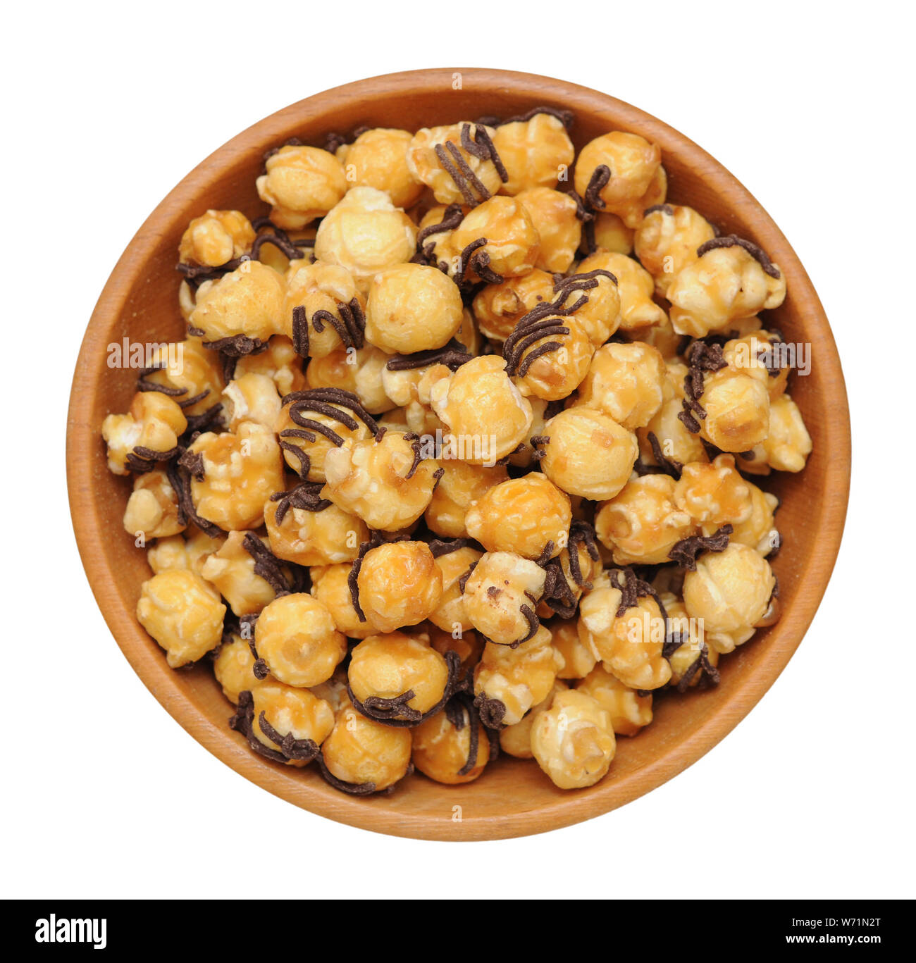 carmel and chocolate popcorn in wooden bowl isolated on white Stock ...