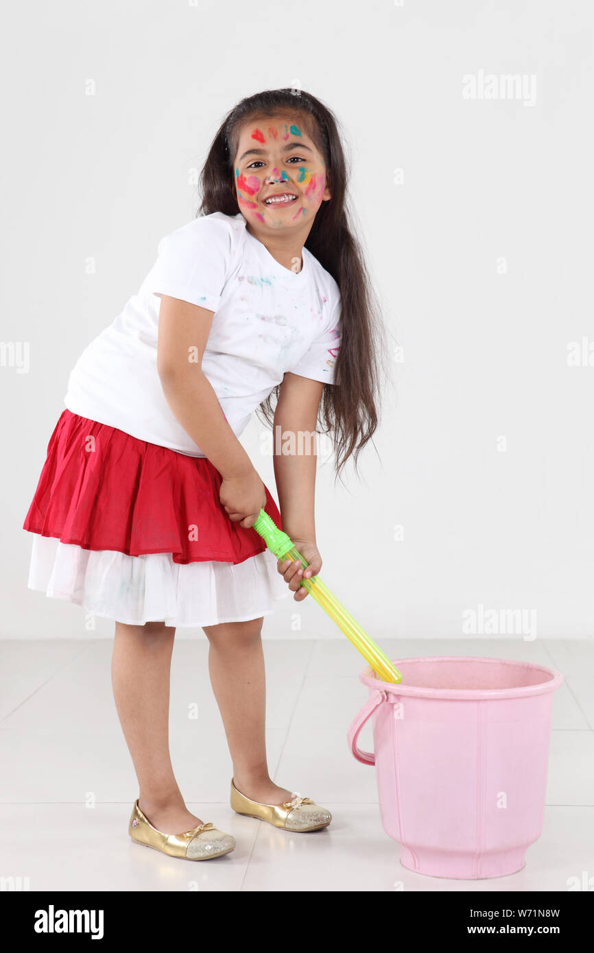 Child playing holi festival hi-res stock photography and images - Alamy