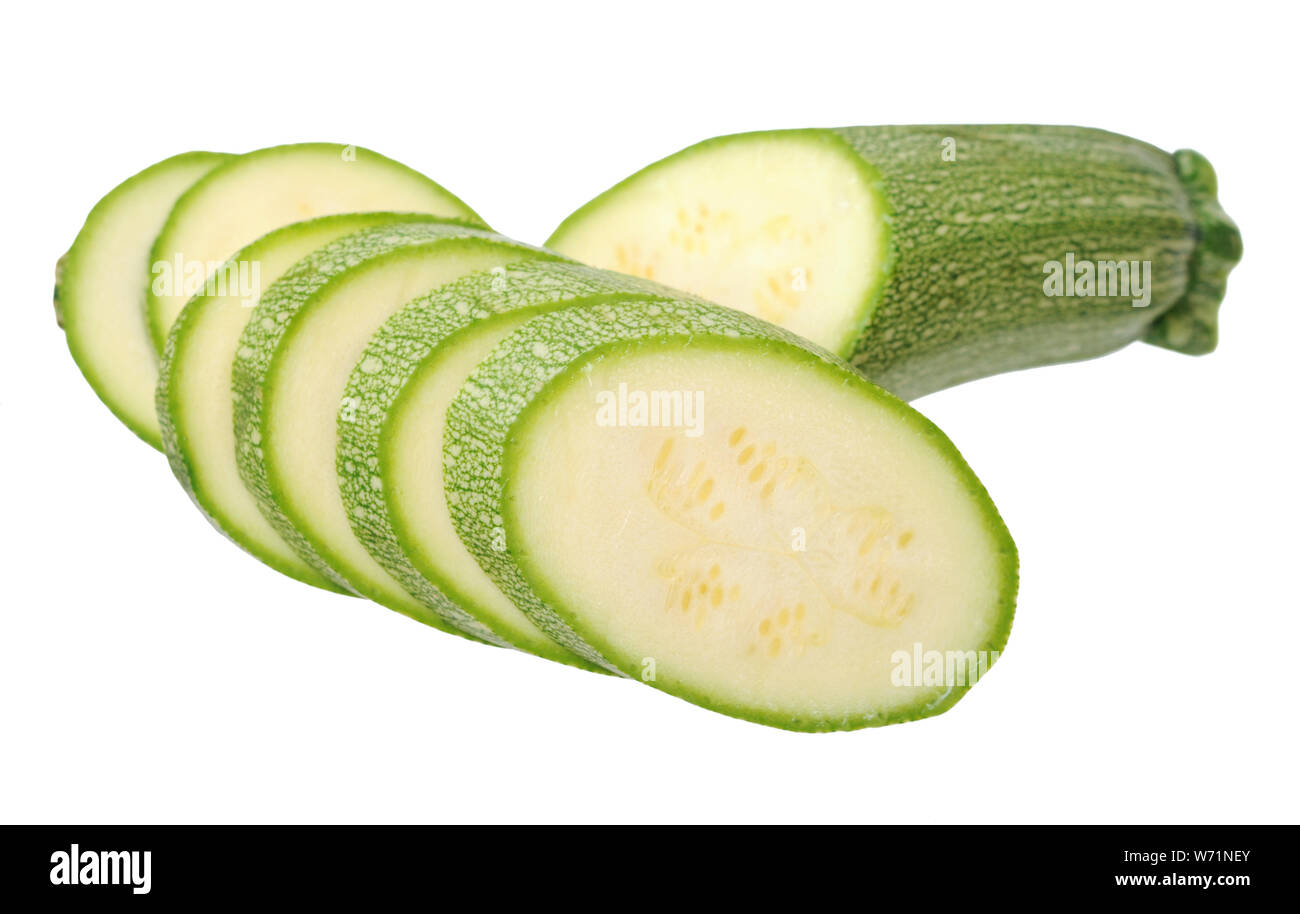 chopped marrow zucchini isolated on white background Stock Photo - Alamy