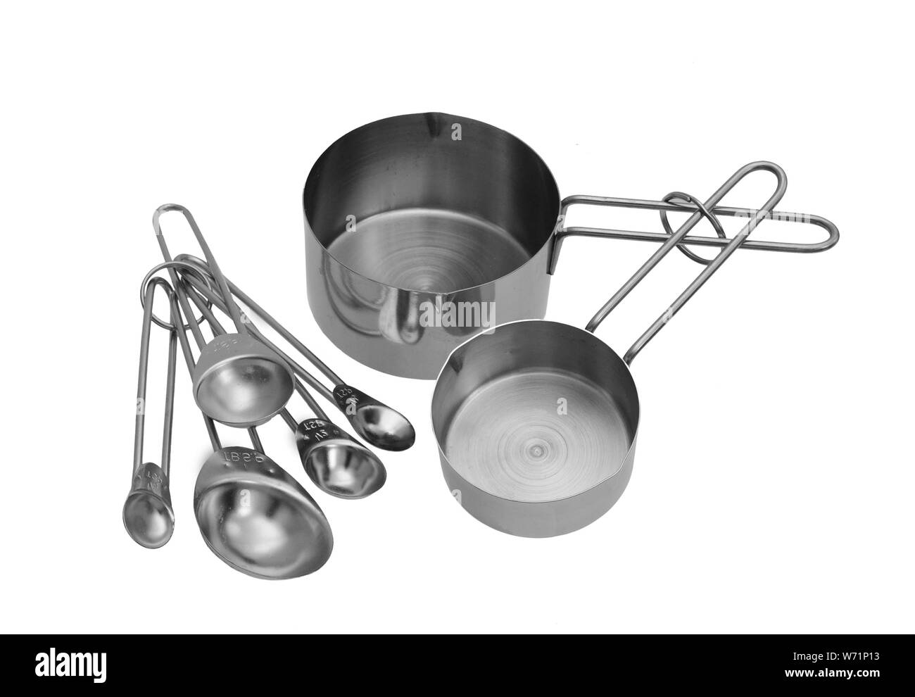 Stainless steel single spoon Black and White Stock Photos & Images - Alamy