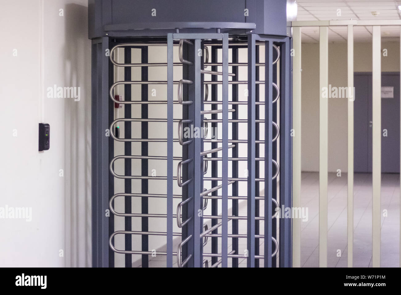 Big steel full turn turnstiles. Concept of security, business, prison ...