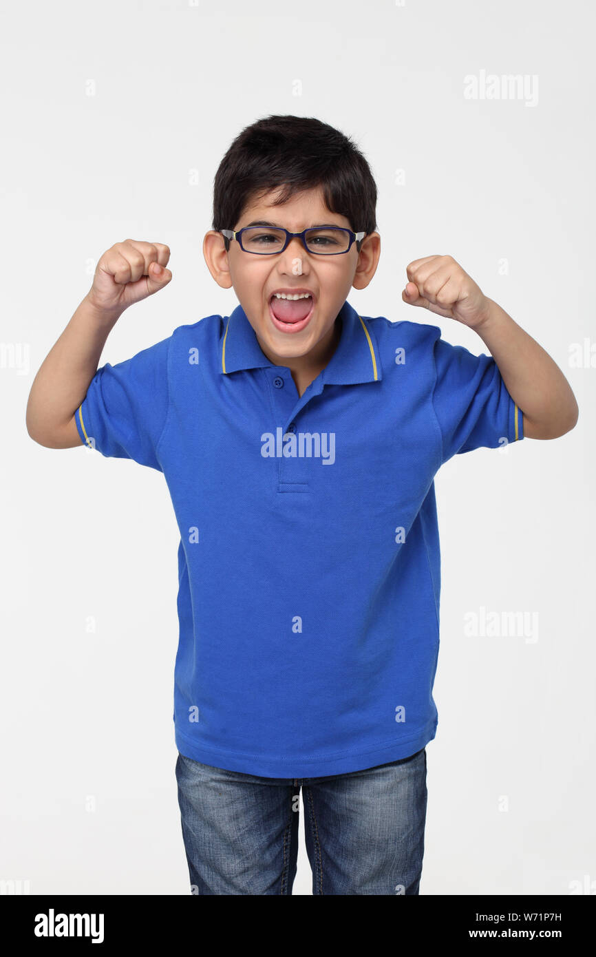 Indian boy shouting Stock Photo - Alamy