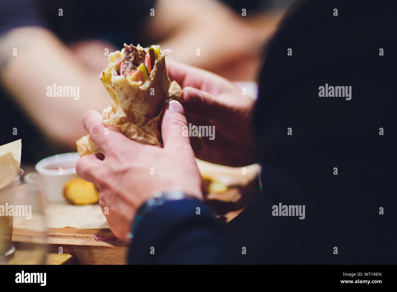 Man eating doner kebab hi-res stock photography and images - Alamy