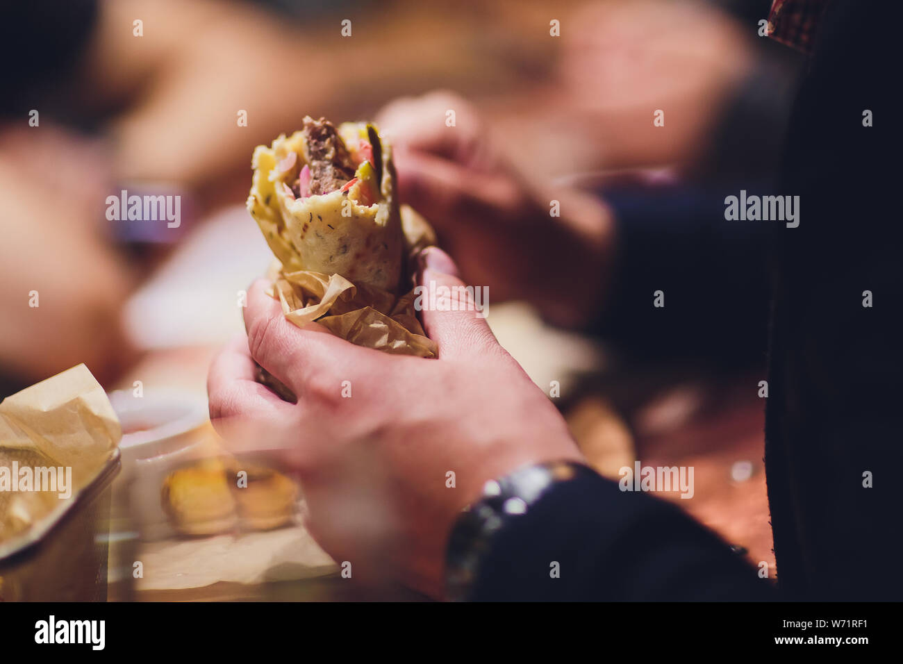 Man eating doner kebab hi-res stock photography and images - Alamy