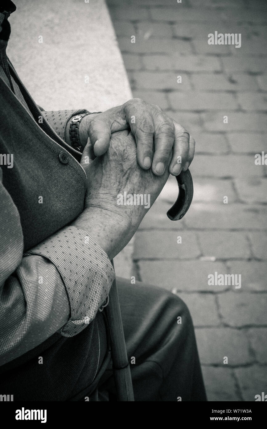 Man holding stick hi-res stock photography and images - Alamy
