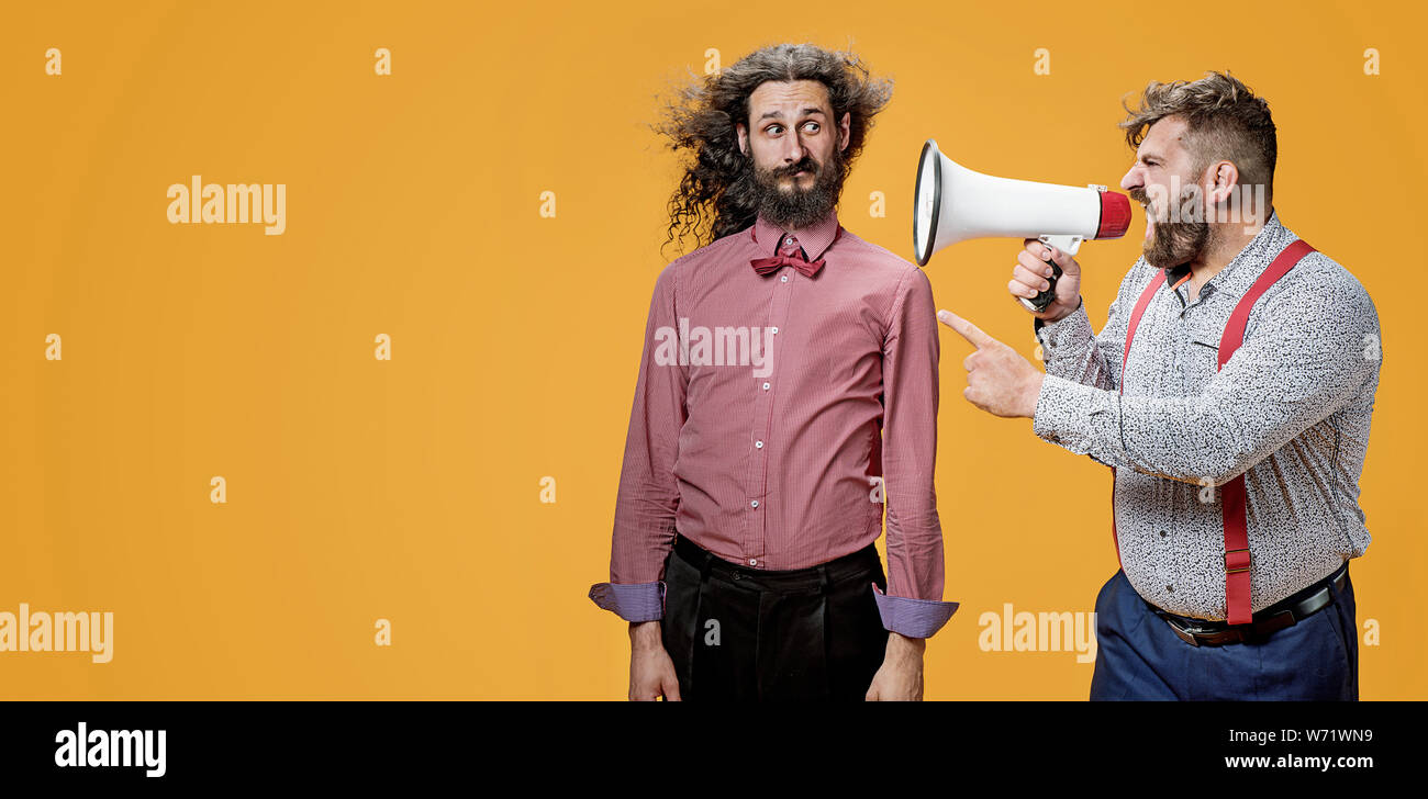 Angry boss yelling at his employee with a megaphone Stock Photo - Alamy