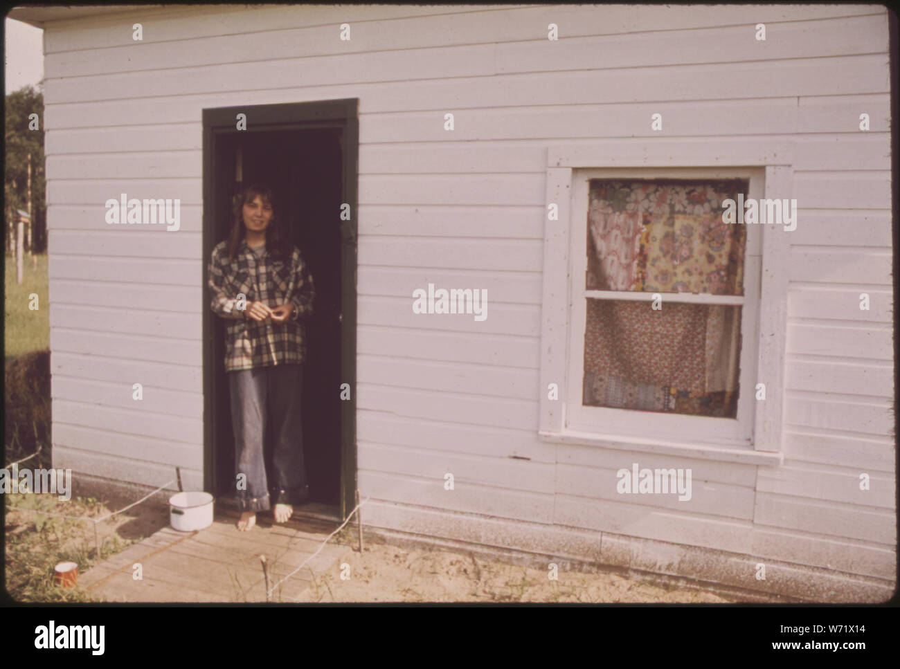 ANN SCHINDLER STANDS IN THE DOORWAY OF HER HOUSE IN GRYGLA Stock Photo ...