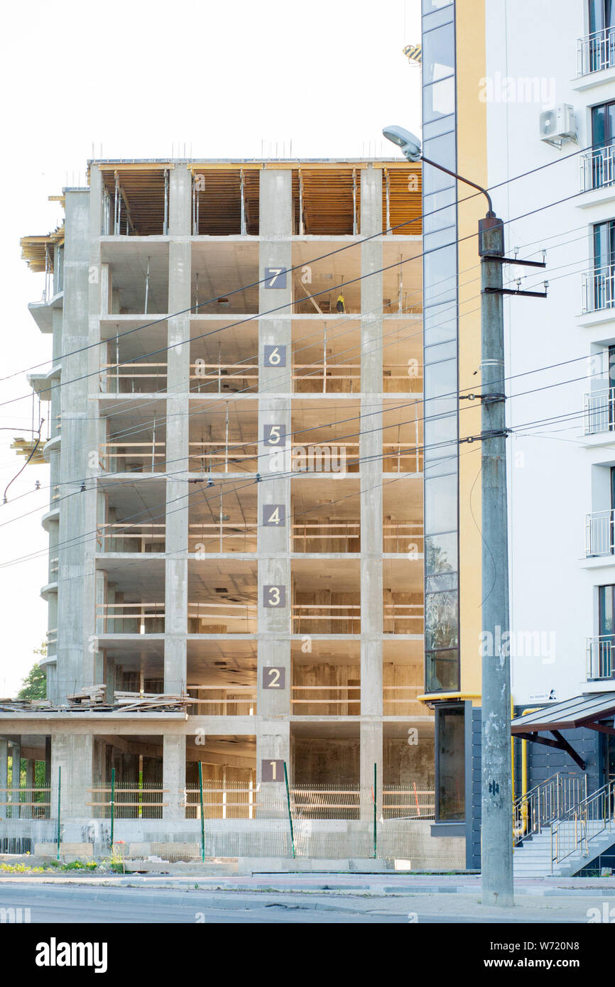 Modern building under construction detail, concrete frame, window ...