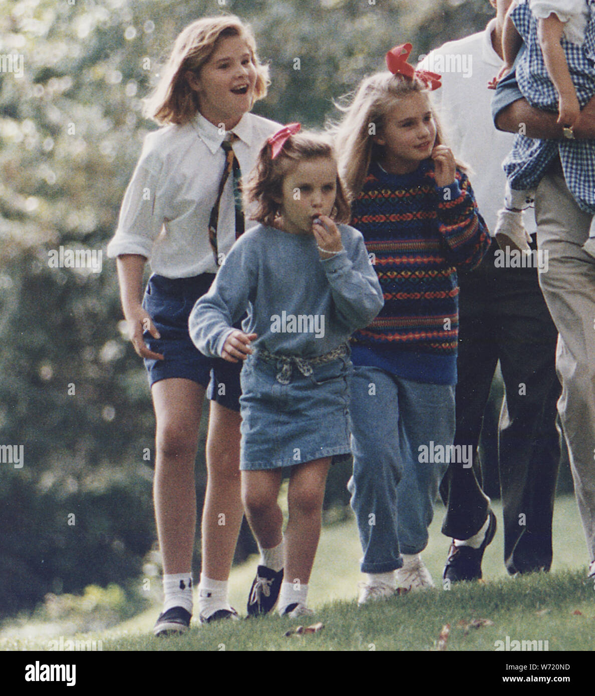 President and Mrs. Bush walk with their grandchildren at Camp David ...