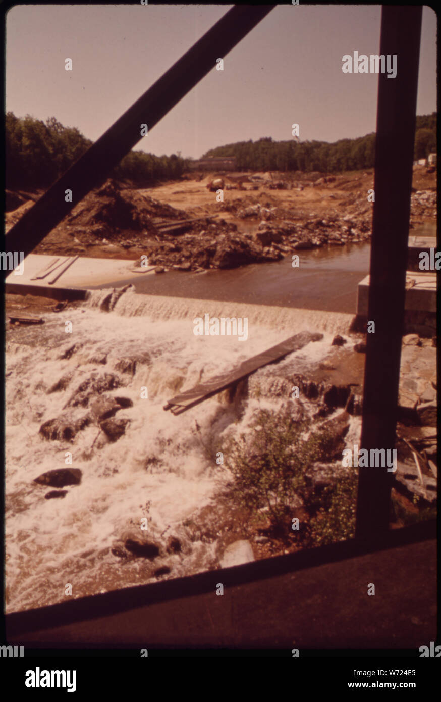DAM ON THE WHITMAN RIVER JUST BELOW THE WEYERHAEUSER PAPER MILL. ON THE ...