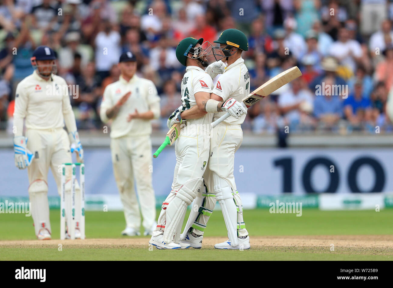 Australia's Matthew Wade (left) celebrates with Tim Paine after ...