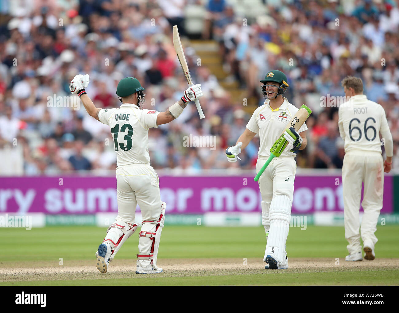 Australia's Matthew Wade (left) celebrates with Tim Paine after ...