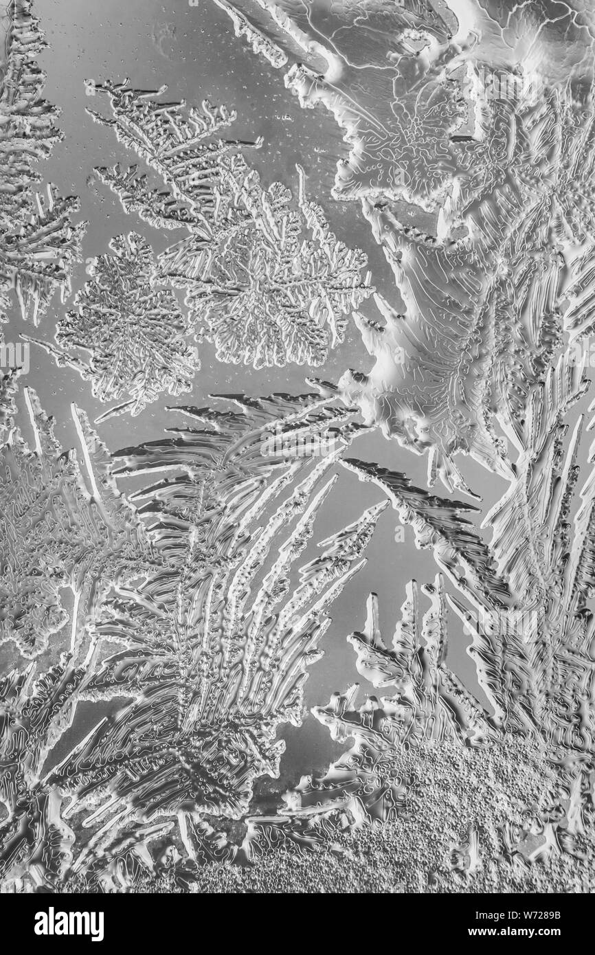 Frosty pattern at a winter window glass Stock Photo - Alamy