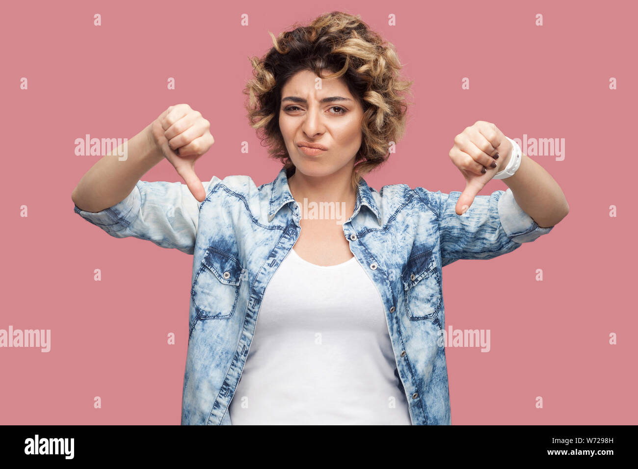 Dissatisfied young indian woman hi-res stock photography and images - Alamy