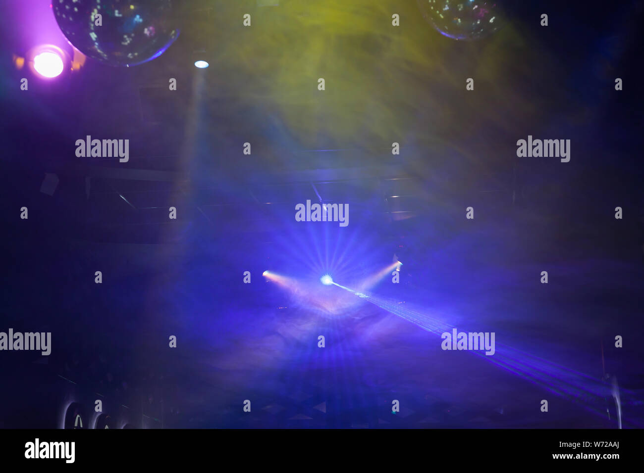 Disco light show, Stage lights with laser Stock Photo - Alamy