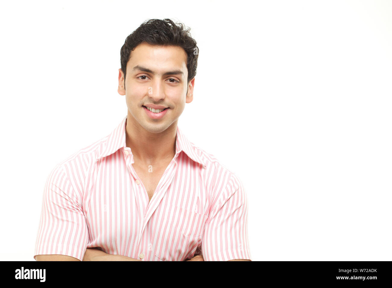Portrait of an Indian young man smiling Stock Photo - Alamy
