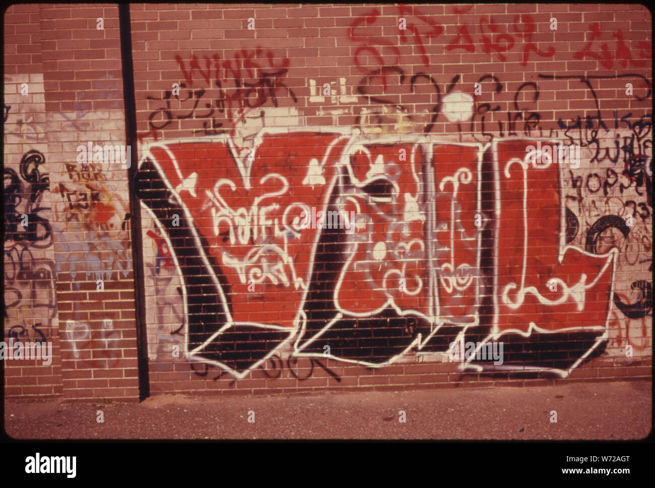 GRAFFITI WITH A SUPERGRAPHIC VAIL AND OTHER WORDS ON A WALL IN BROOKLYN ...