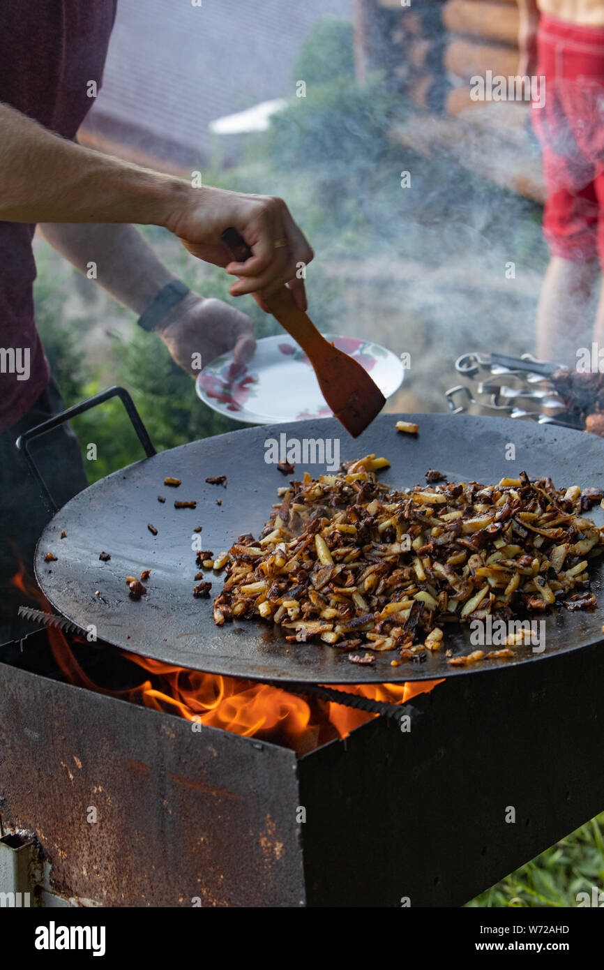 cooking meat at bbq fire close up Stock Photo - Alamy