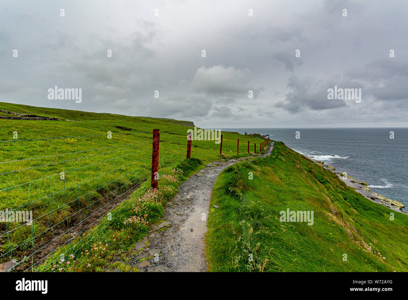 Landscape of the coast and a rural footpath in of the coastal route ...
