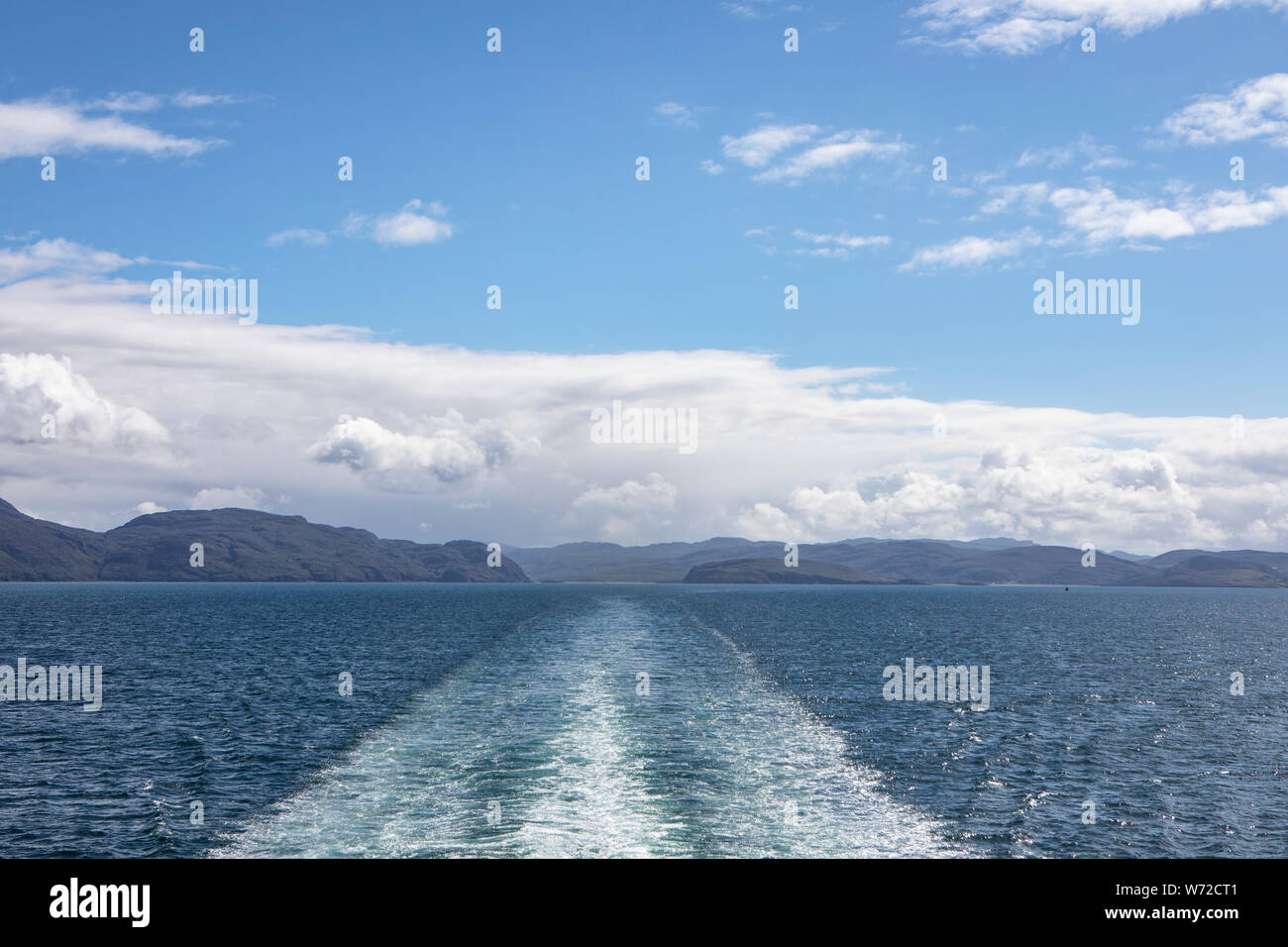 ship waves of a ferry boat Stock Photo - Alamy