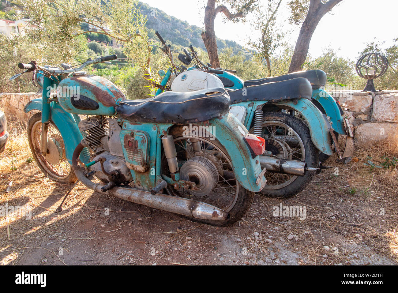 Rusting, abandoned Russian retro soviet motorcycles made by Izh ...