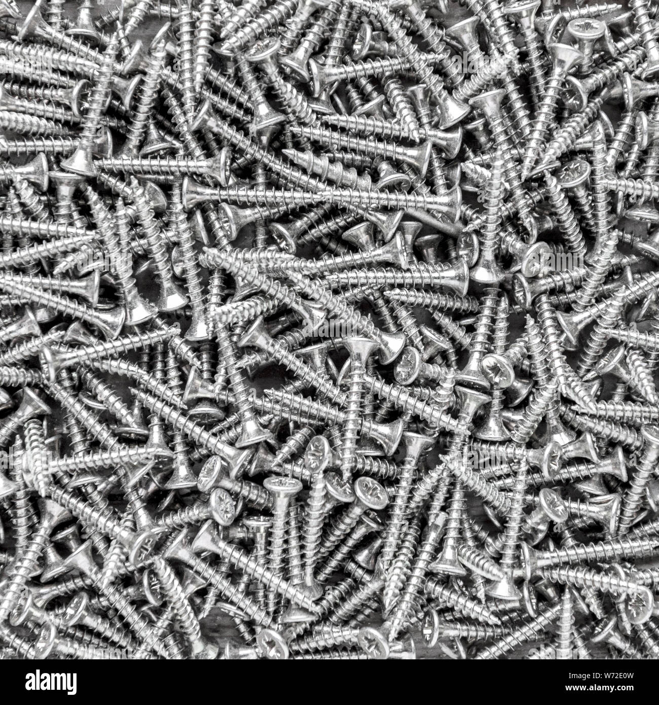 Metal screws background, black and white industrial iron texture Stock ...