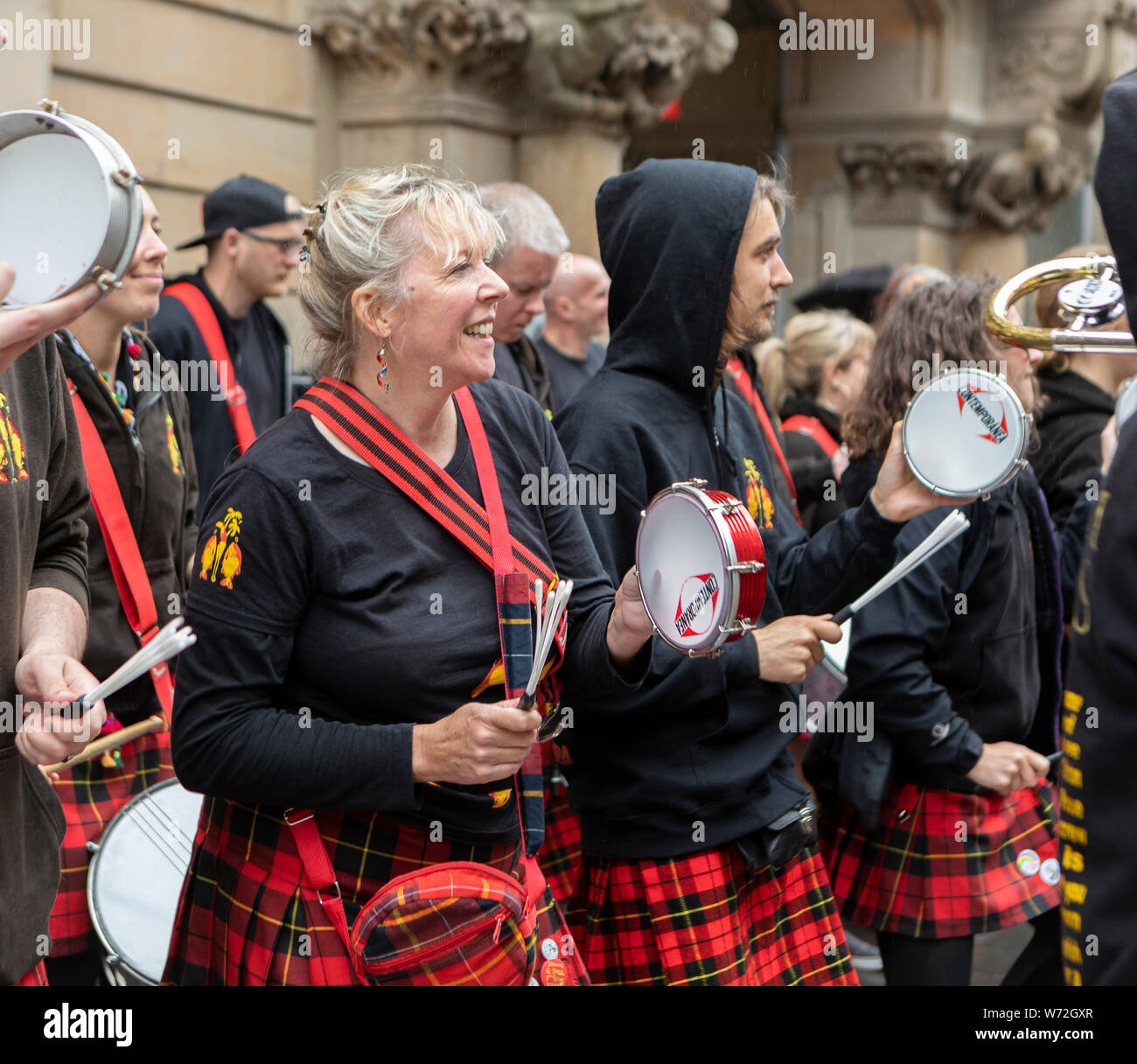 music band with traditional Scottish kilts performing in Glasgow city ...