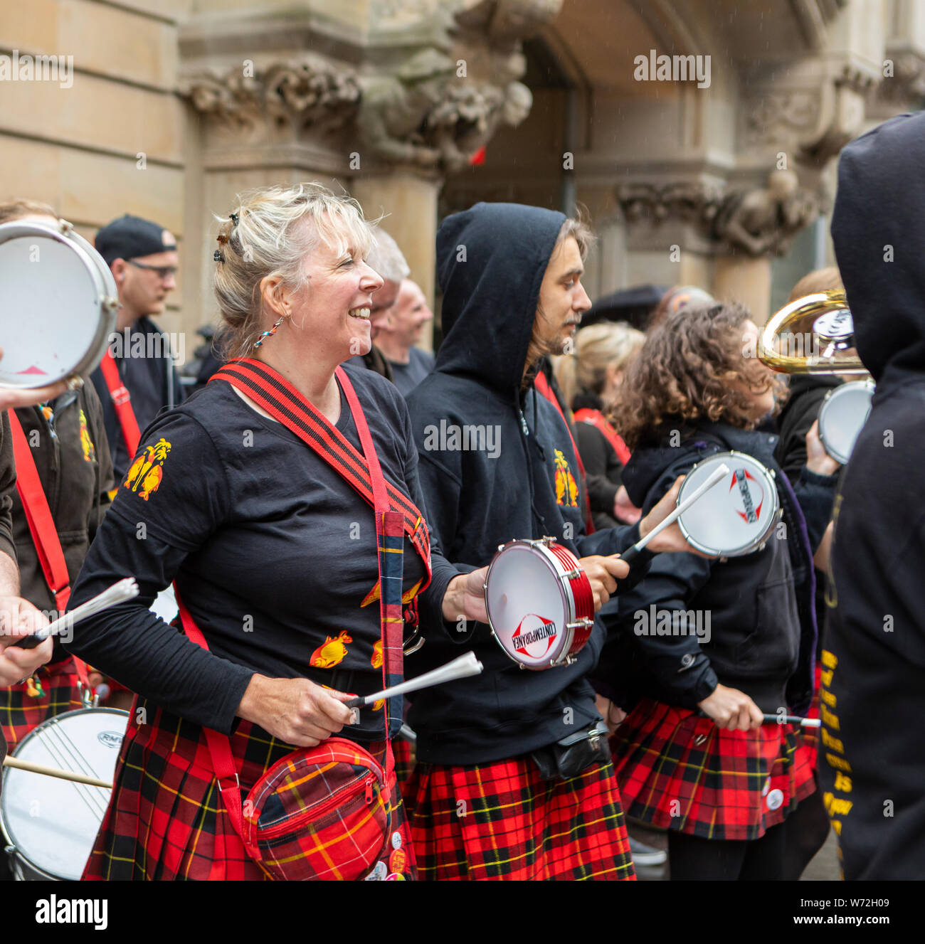 music band with traditional Scottish kilts performing in Glasgow city ...