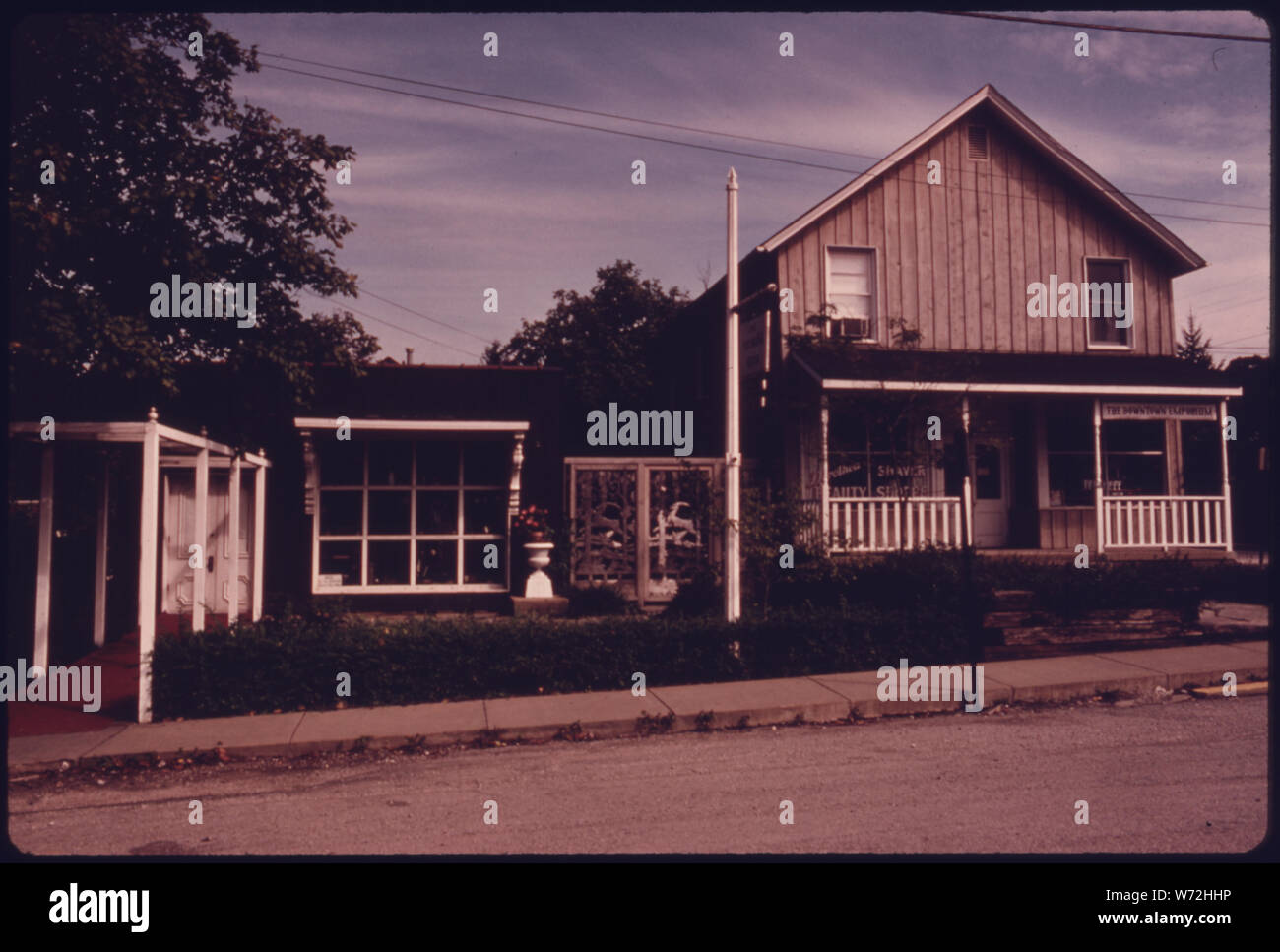 LOOKING AT MAIN STREET IN PENINSULA, OHIO, NEAR AKRON SHOWING BUILDINGS ...