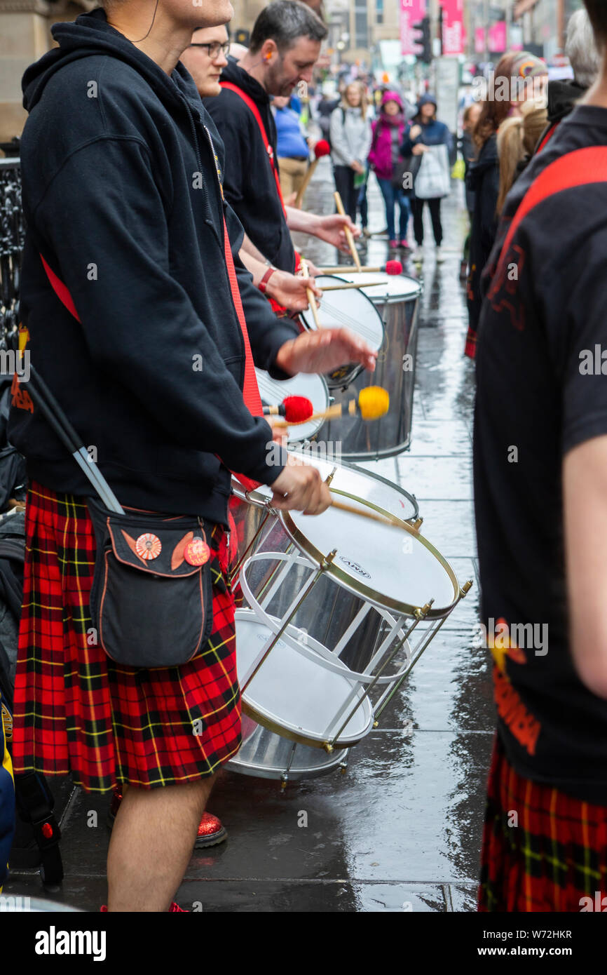 music band with traditional Scottish kilts performing in Glasgow city ...