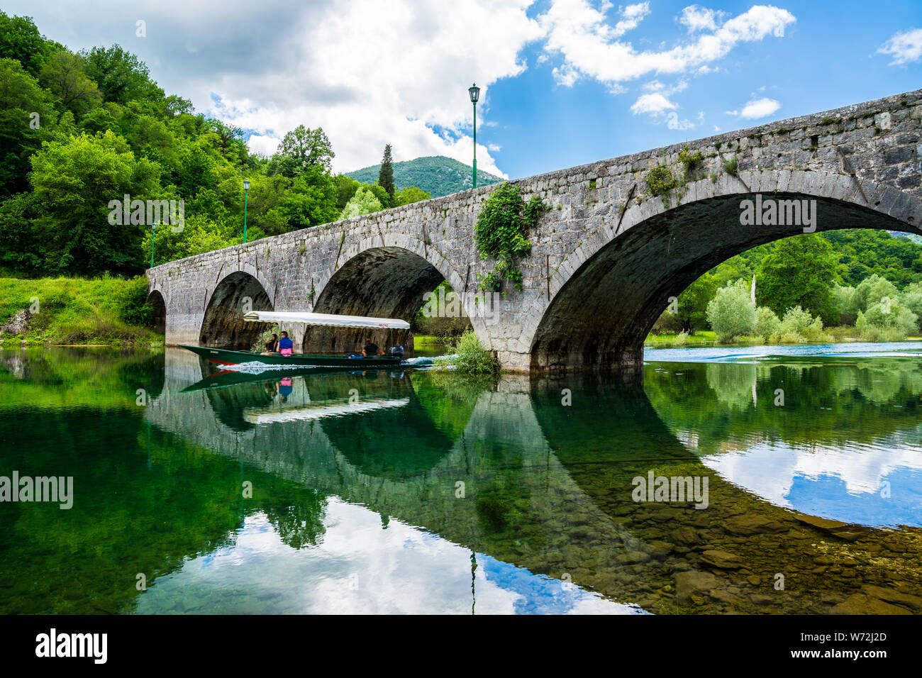 Cetinje, Montenegro, May 22, 2019, Tourists on boat tour driving fast ...