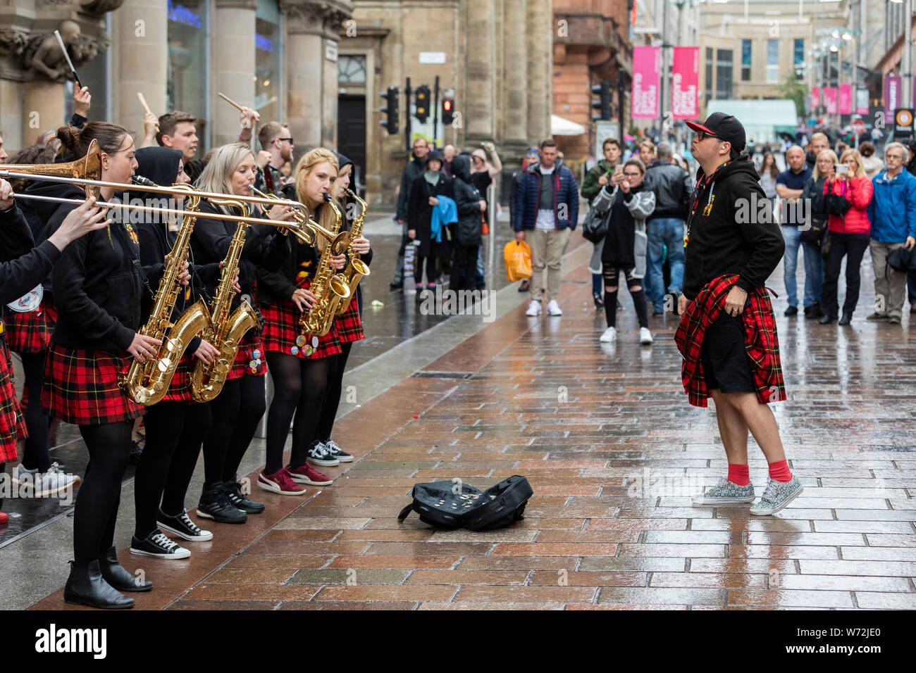 music band with traditional Scottish kilts performing in Glasgow city ...