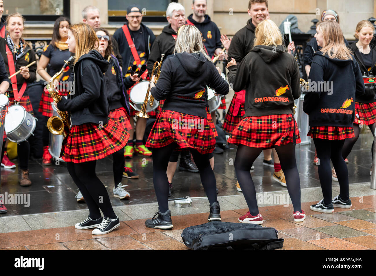 music band with traditional Scottish kilts performing in Glasgow city ...