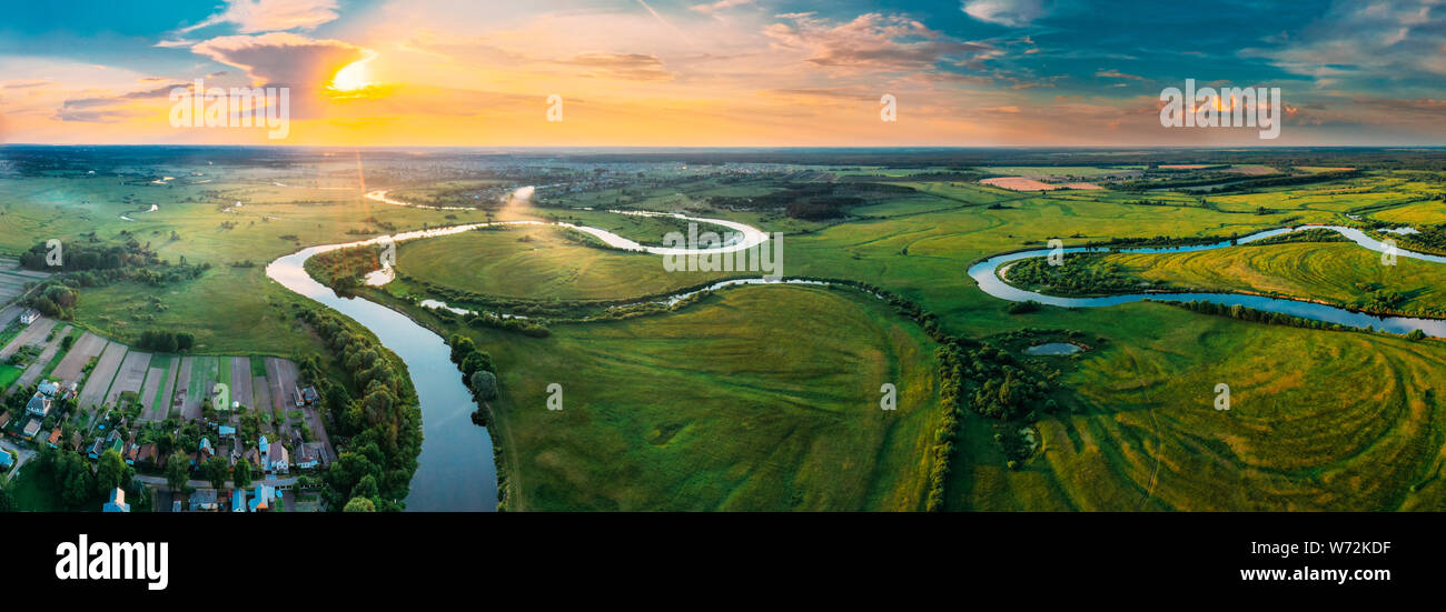 Aerial View Green Forest Woods Meadow And River Landscape In Sunny ...