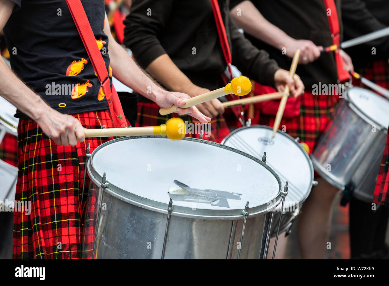 music band with traditional Scottish kilts performing in Glasgow city ...