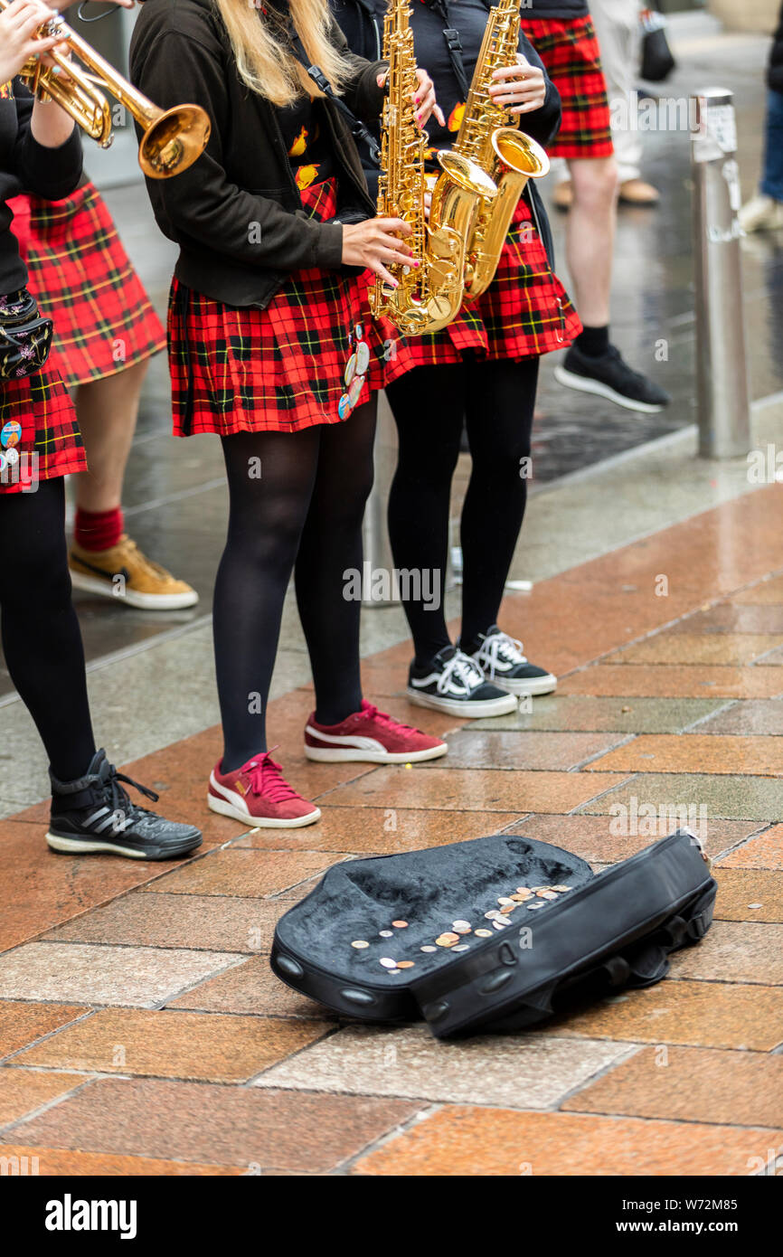 music band with traditional Scottish kilts performing in Glasgow city ...