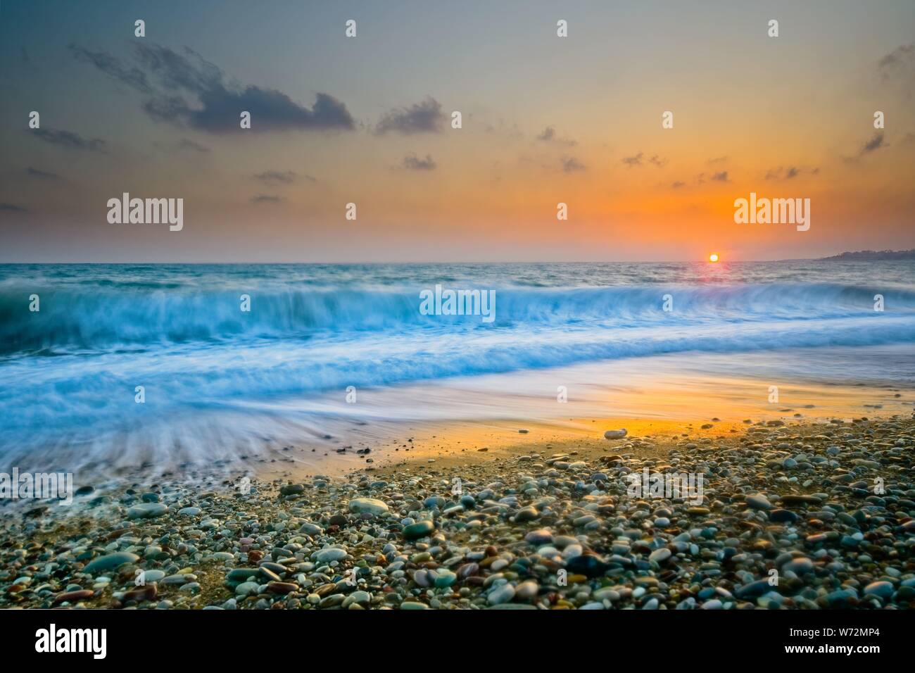 Sunset beach Cyprus Stock Photo - Alamy