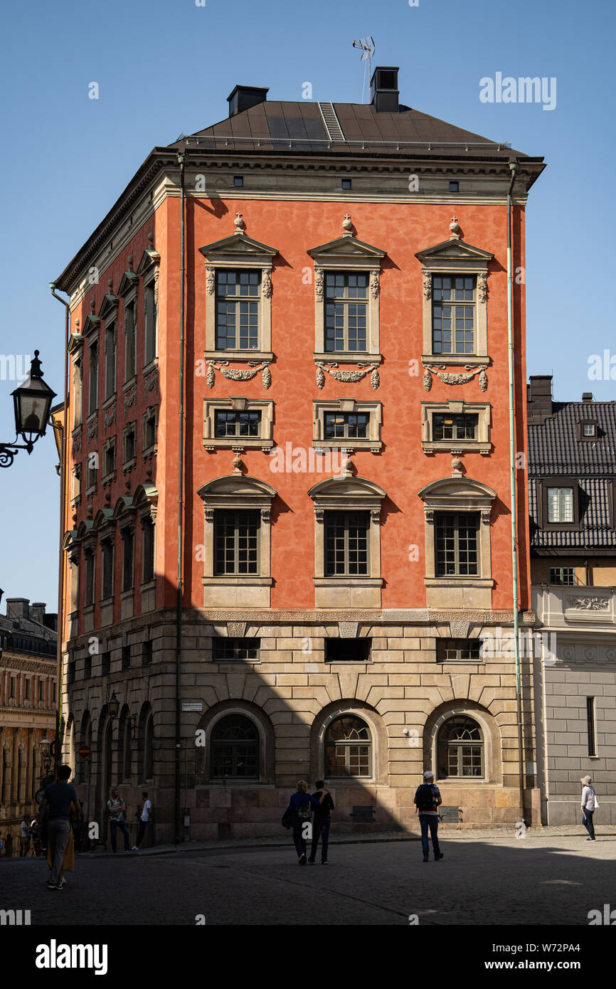 Old terracotta coloured buildings in Gamla Stan (Old Town), Stockholm ...