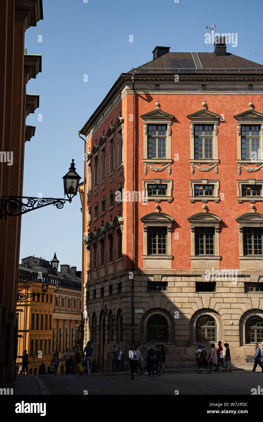 Old terracotta coloured buildings in Gamla Stan (Old Town), Stockholm ...