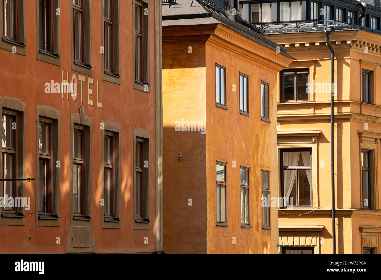 Old terracotta coloured buildings in Gamla Stan (Old Town), Stockholm ...