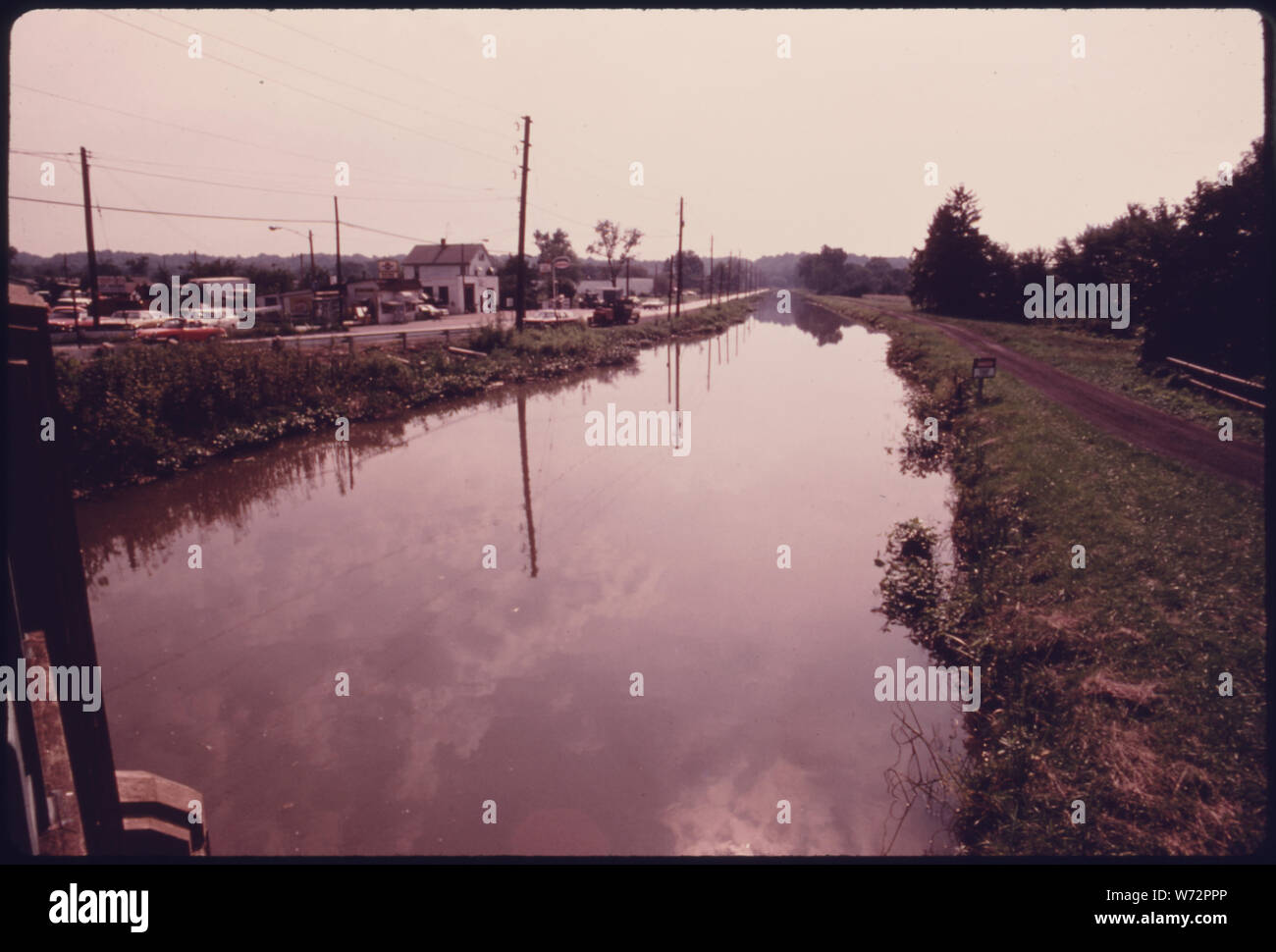 OHIO-ERIE CANAL WITH TOWPATH AT THE RIGHT AND CANAL ROAD AT THE LEFT ...