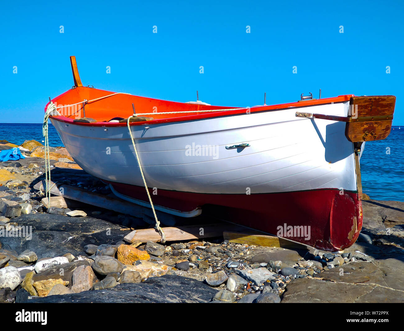 Wood boat outside the water Stock Photo - Alamy