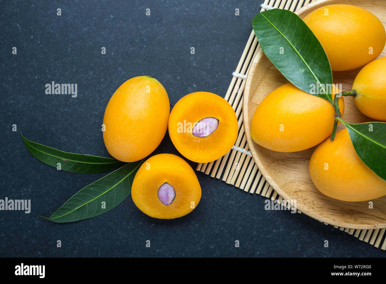 Close up fresh yellow marian plum fruit (Mayongchid in Thai name) on ...