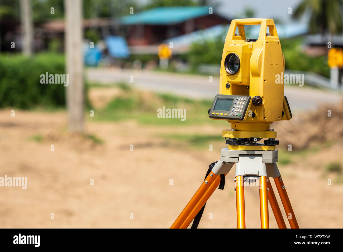 Land checking : Surveyor engineer making measure at the land Stock ...