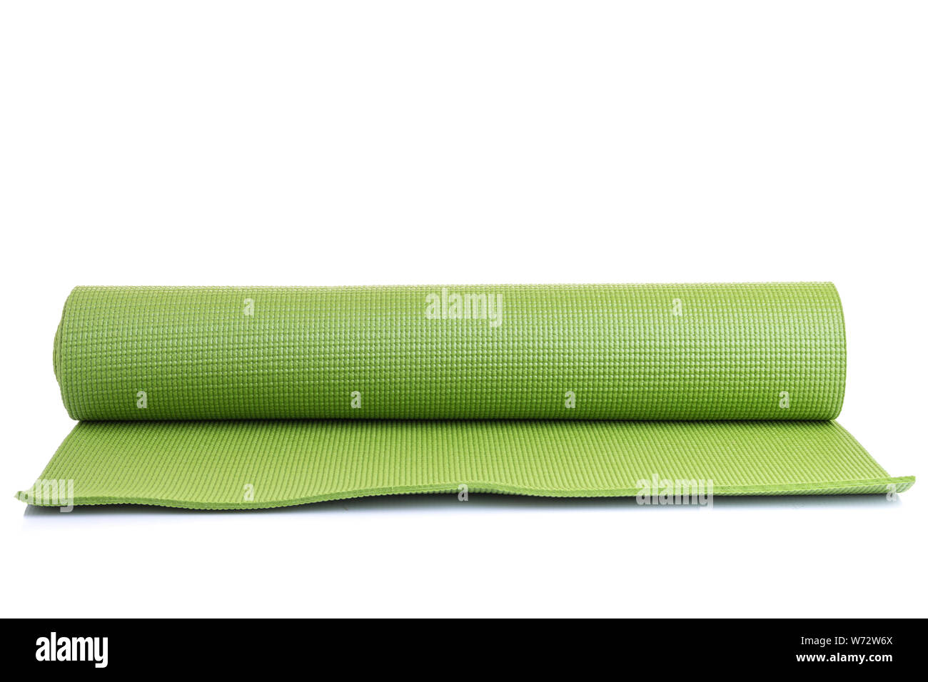 New green soft Yoga mat. Studio shot isolated on white background Stock ...