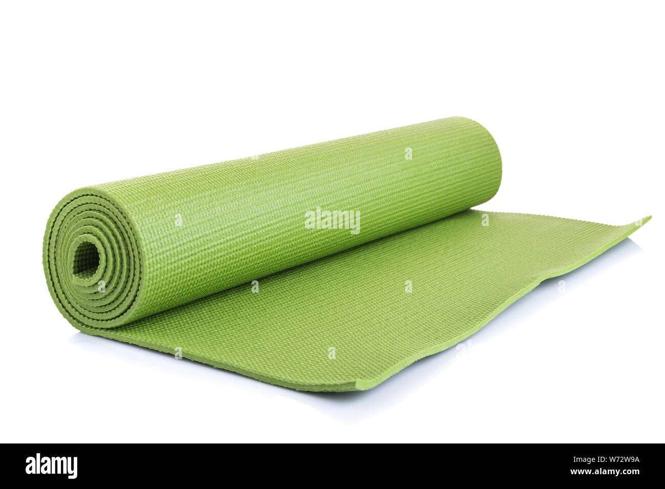 New green soft Yoga mat. Studio shot isolated on white background Stock ...