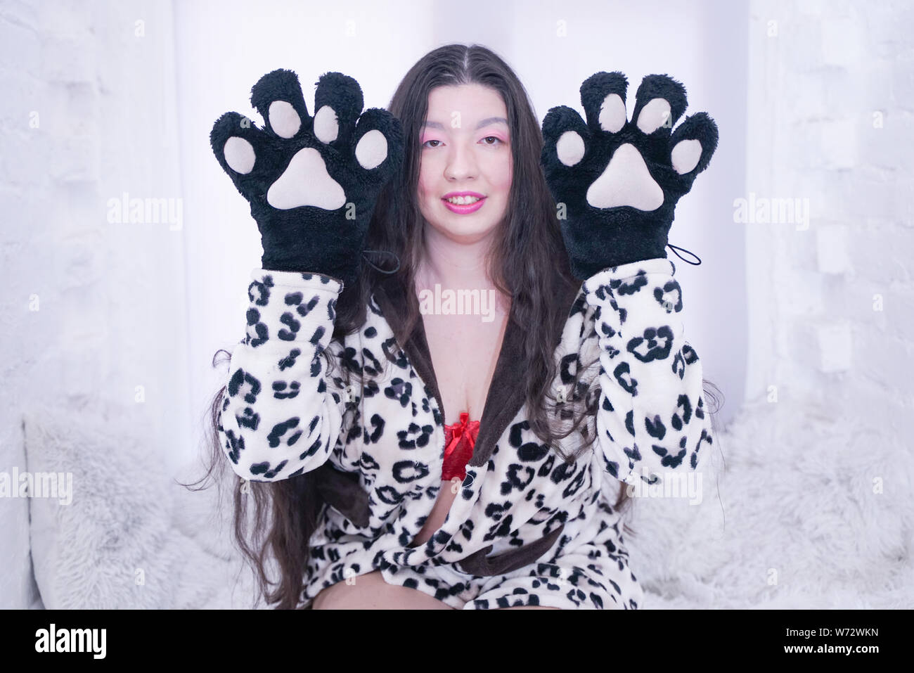 Asian girl wears Cat Paw Gloves for Cosplay on White Background Stock ...
