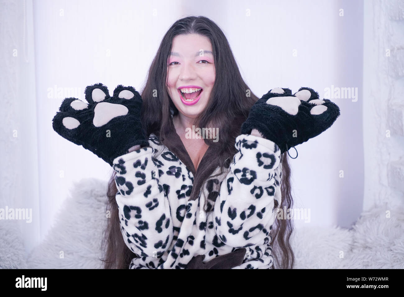 Asian girl wears Cat Paw Gloves for Cosplay on White Background Stock ...